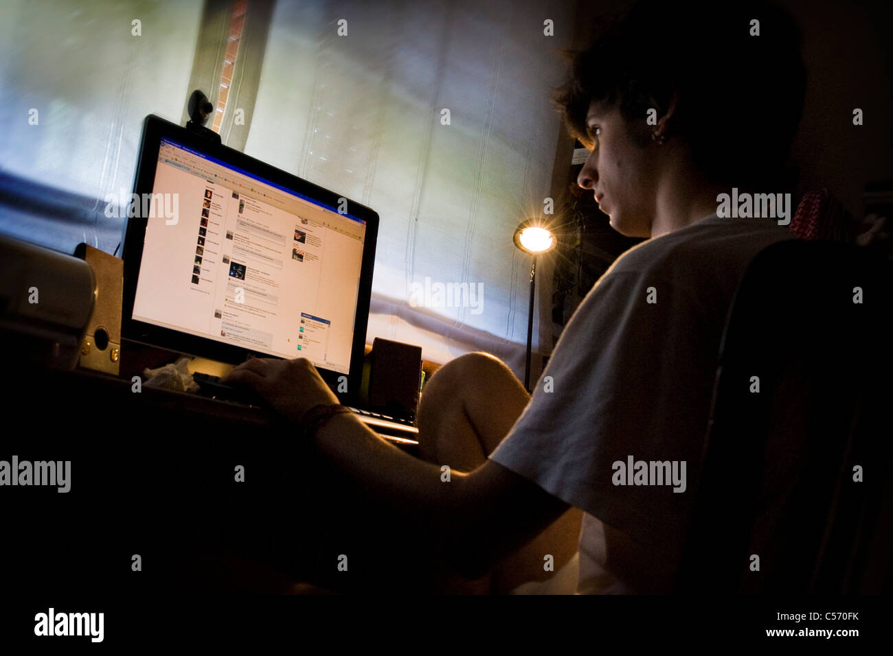 Boy, facebook, computer Stock Photo - Alamy