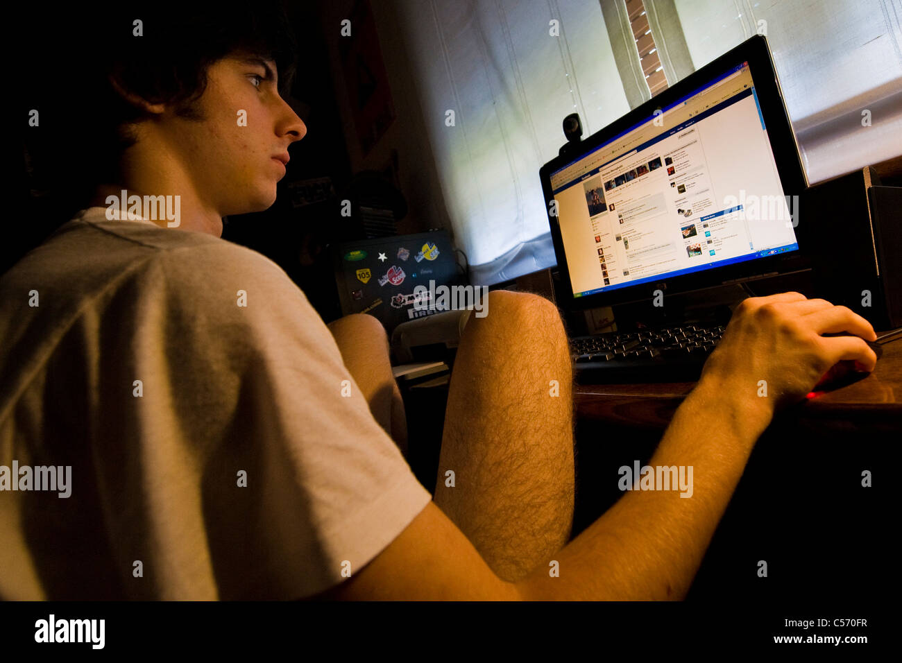Boy, facebook, computer Stock Photo - Alamy