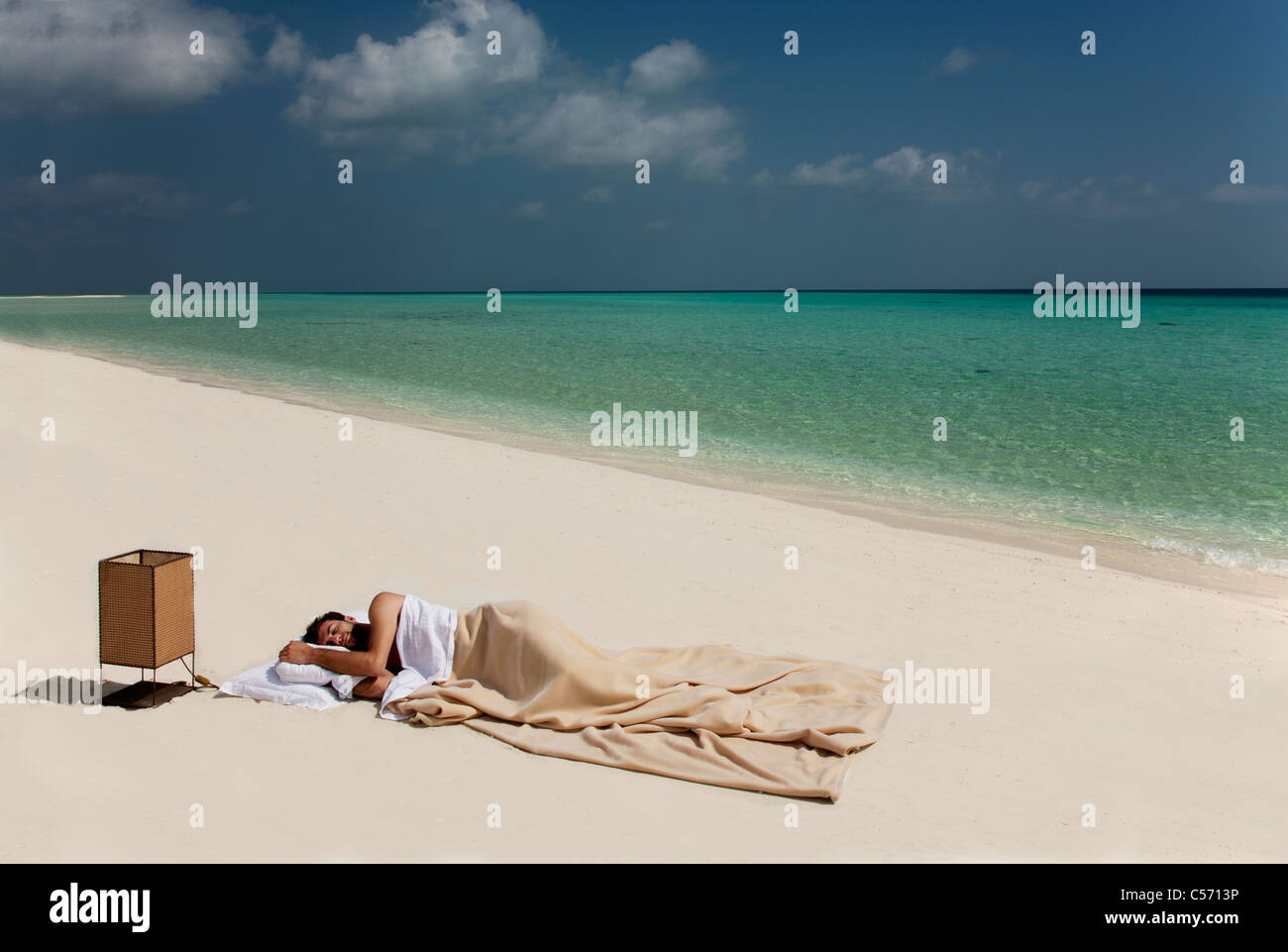 Man Sleeping On Beach High Resolution Stock Photography and Images - Alamy