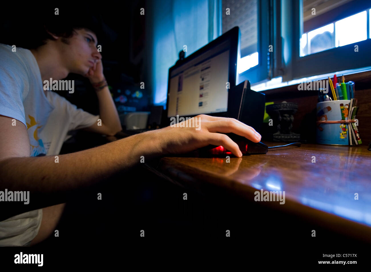 Boy, facebook, computer Stock Photo - Alamy