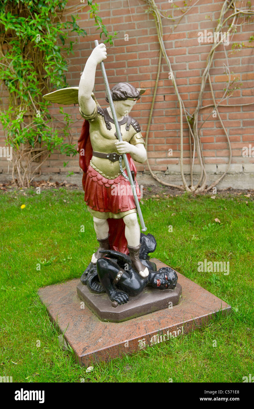 Statue holy Michaël Stock Photo - Alamy