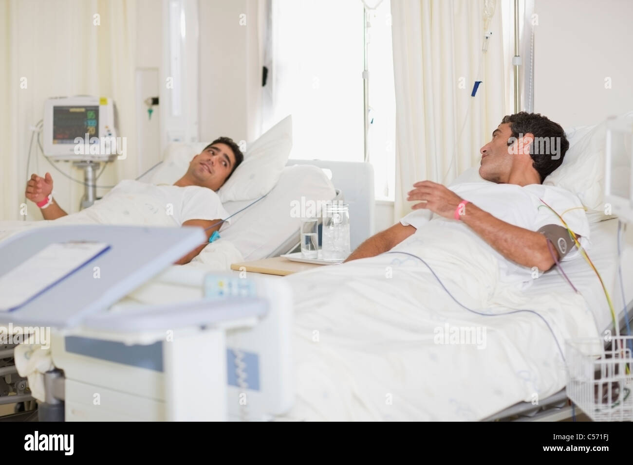 People In Hospital Beds