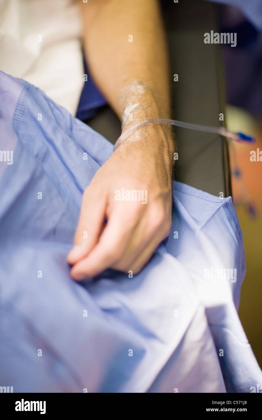 Patient with intravenous drip in arm Stock Photo - Alamy