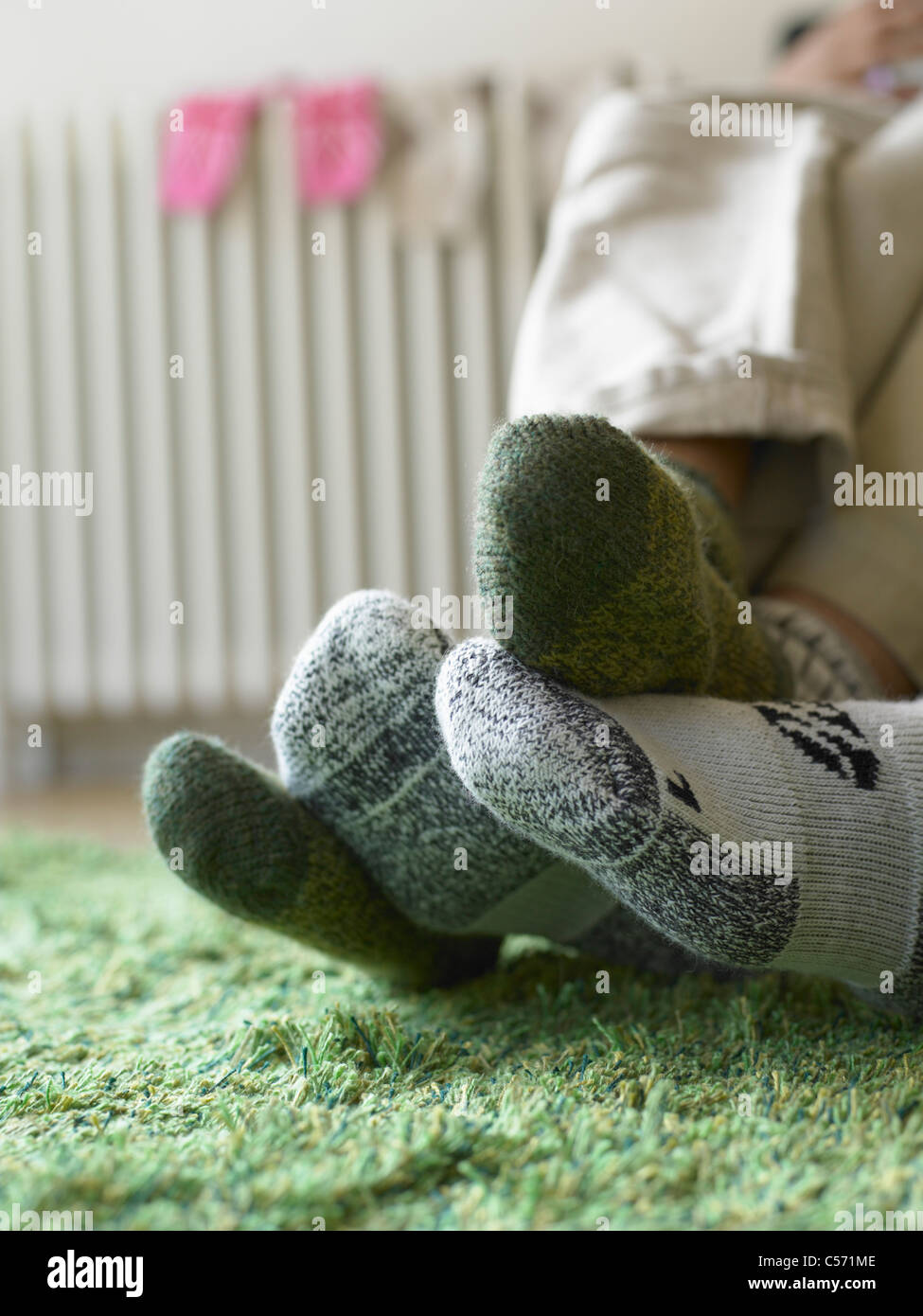 Close up crossed legs feet hi-res stock photography and images - Alamy