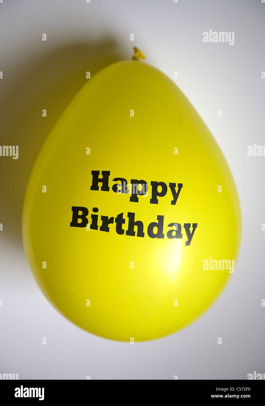 Yellow happy Birthday Balloon Stock Photo - Alamy