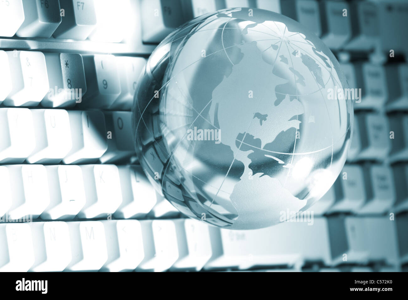 Globe and keyboard Stock Photo - Alamy