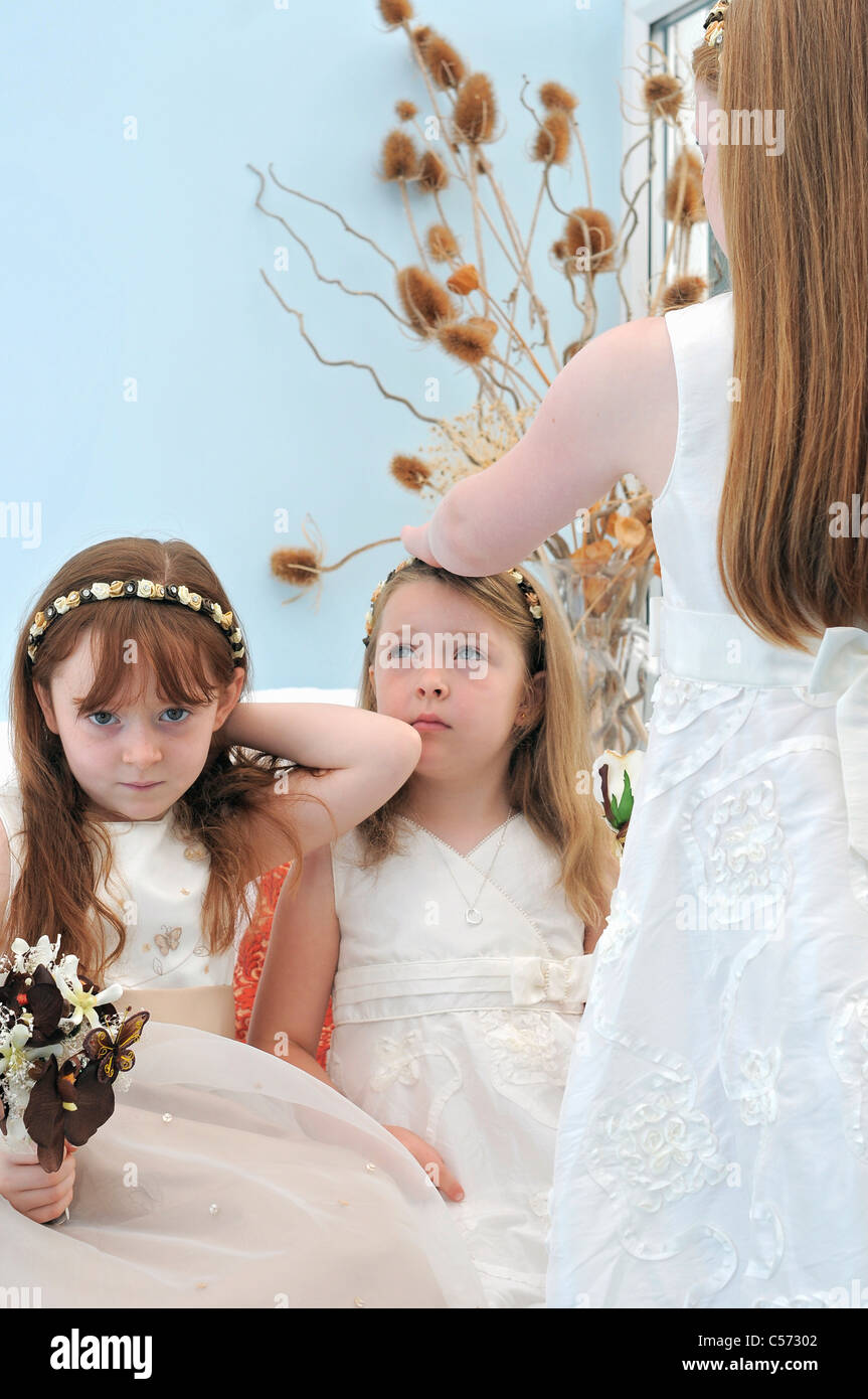 Bored flower girls in wedding Stock Photo - Alamy