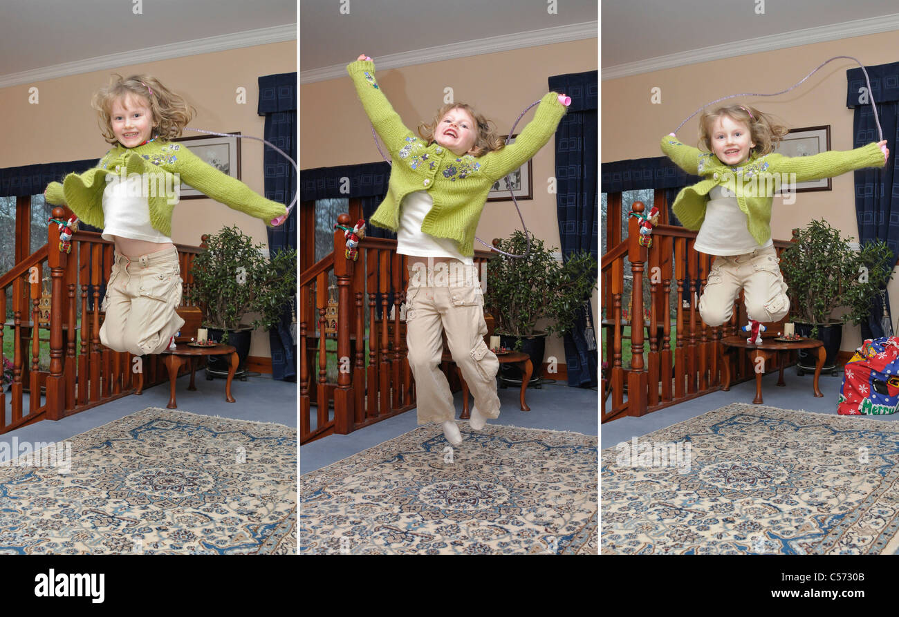 Triptych of girl jumping in house Stock Photo - Alamy