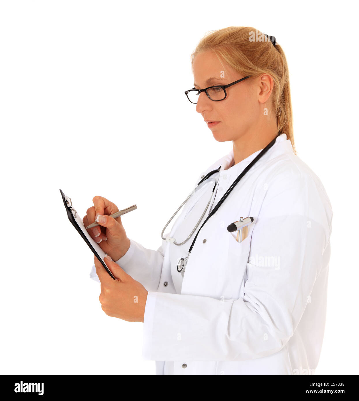 Doctor writing clinical record. All on white background Stock Photo - Alamy