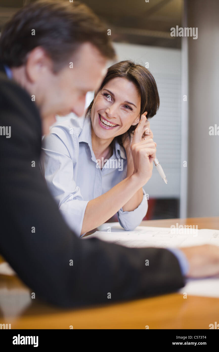 Business people laughing in office Stock Photo - Alamy