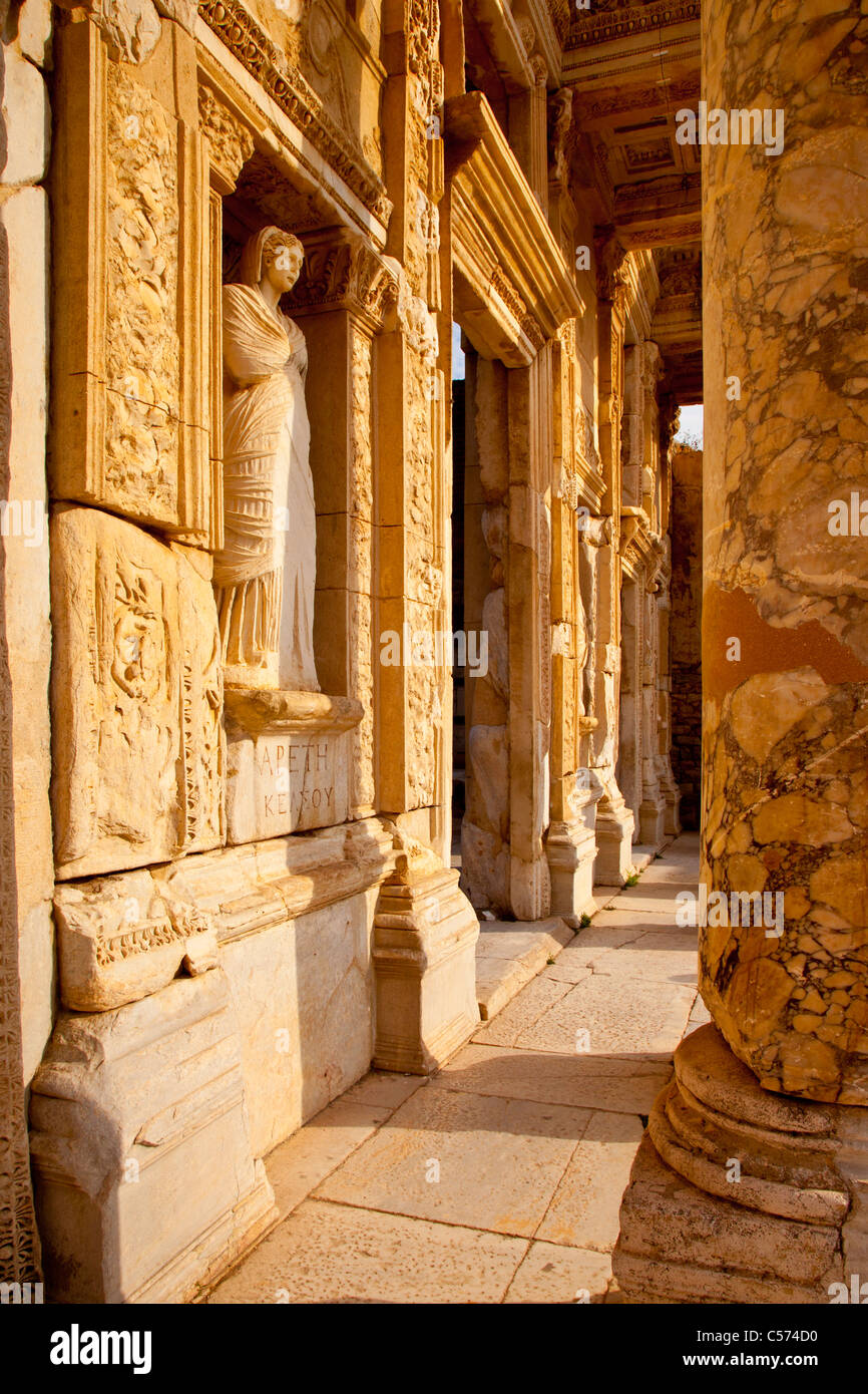Ruins of the Library of Celsus with statue of Athena in ancient city of ...
