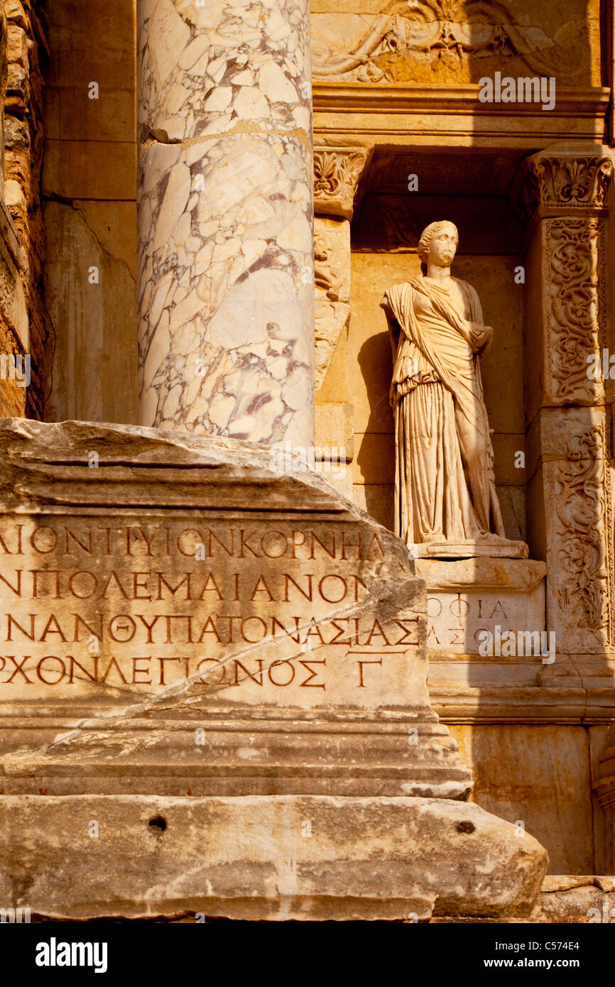 Ruins of the Library of Celsus with statue of Athena in ancient city of ...