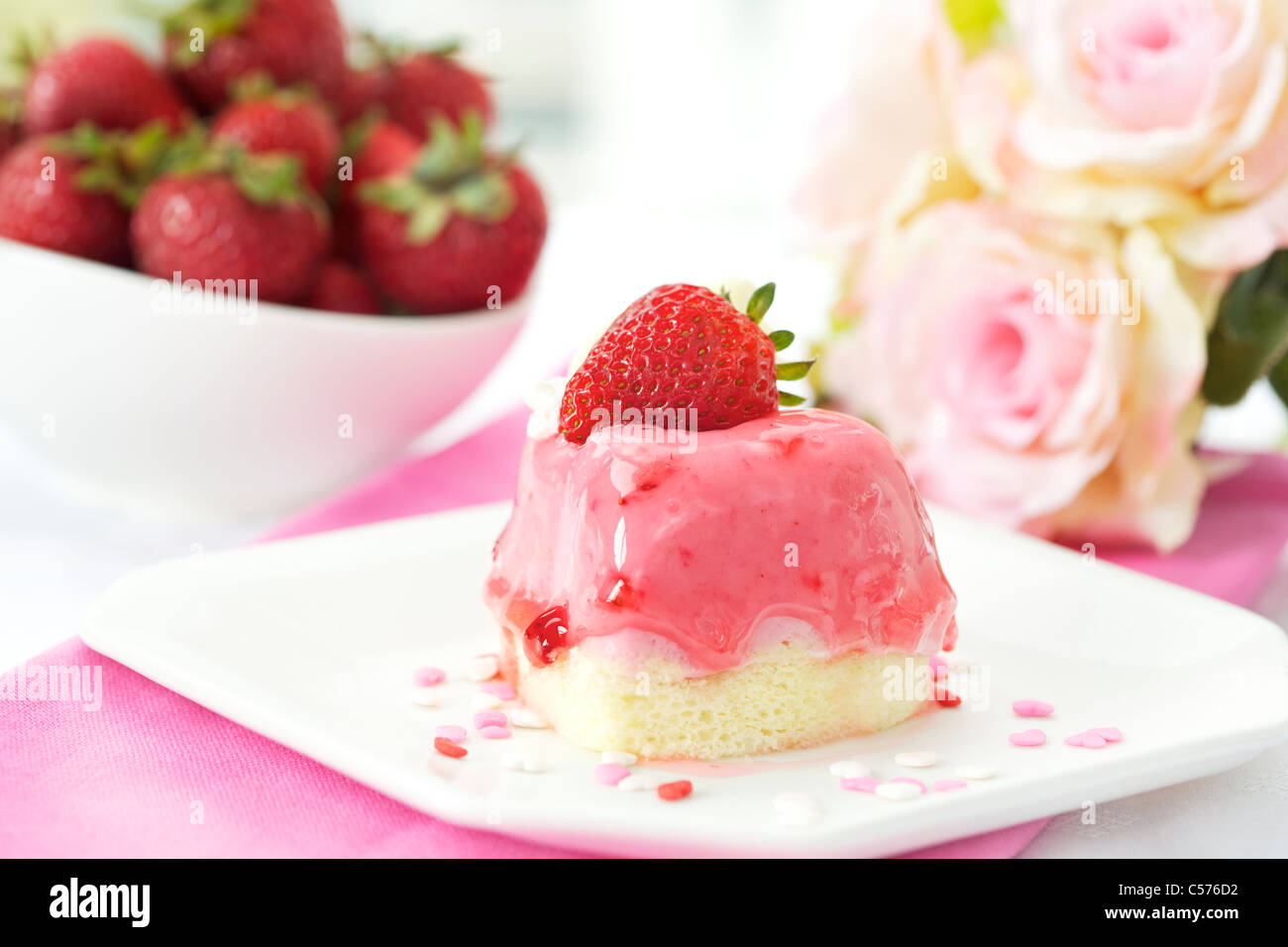 Strawberry sponge cake with fresh strawberry on top Stock Photo - Alamy