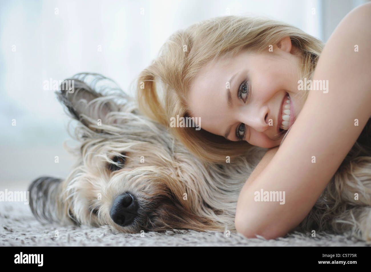 Woman hugging dog hi-res stock photography and images - Alamy