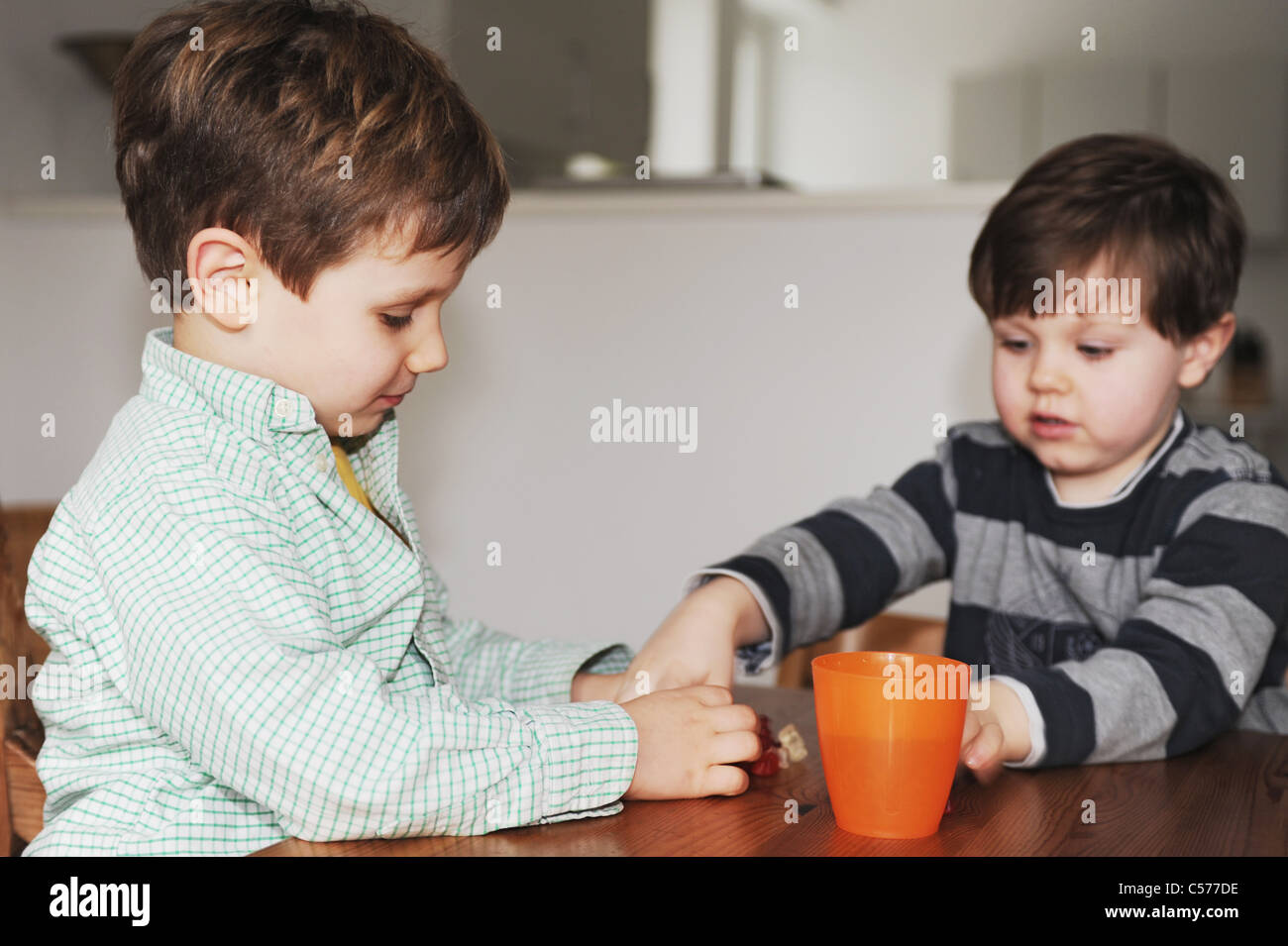 Boys sharing candy hi-res stock photography and images - Alamy