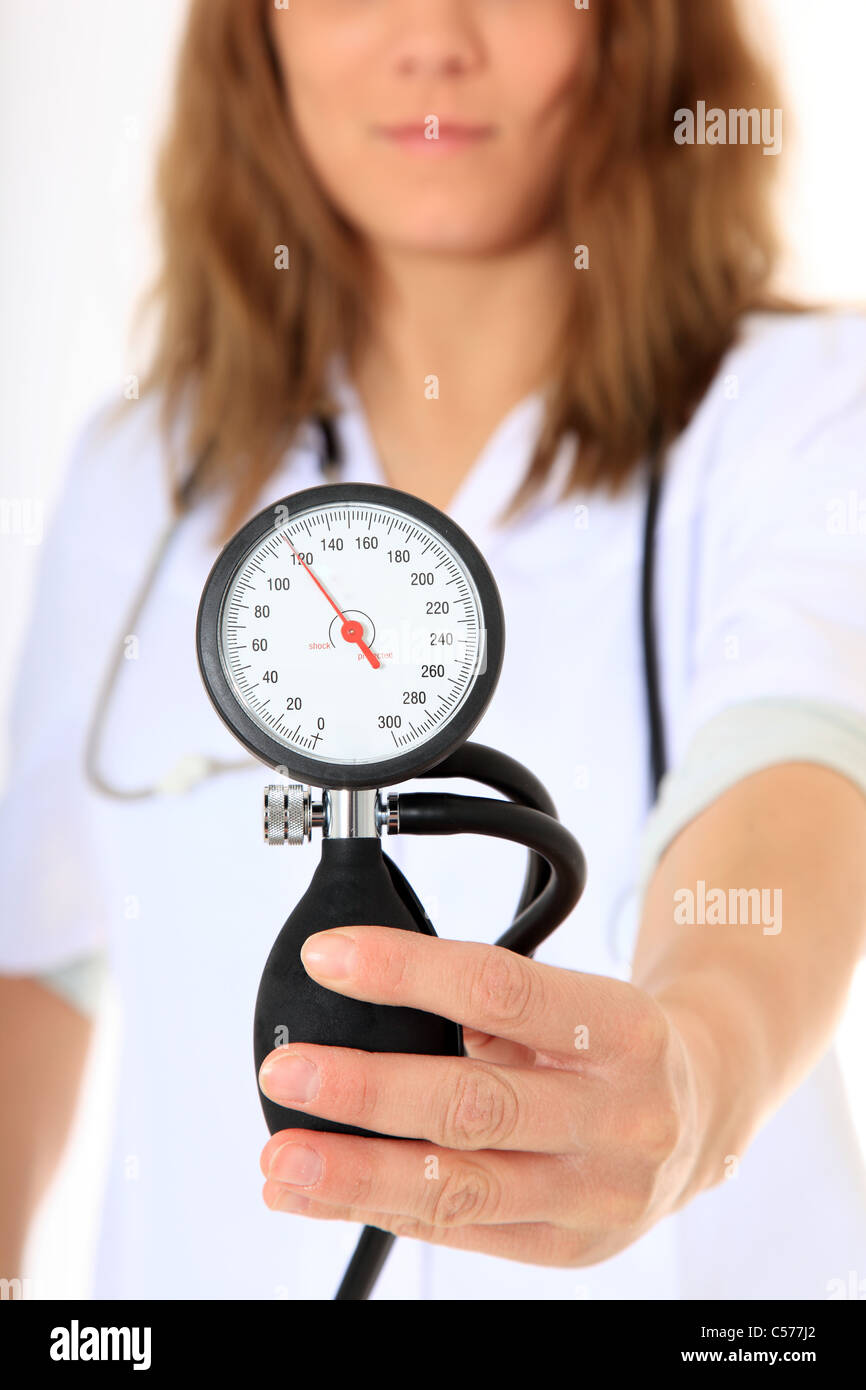 Doctor holding blodd pressure meter. All on white background Stock ...