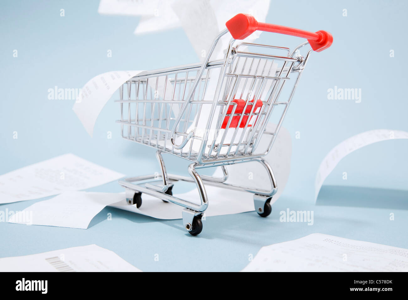 Overflowing shopping cart hi-res stock photography and images - Alamy