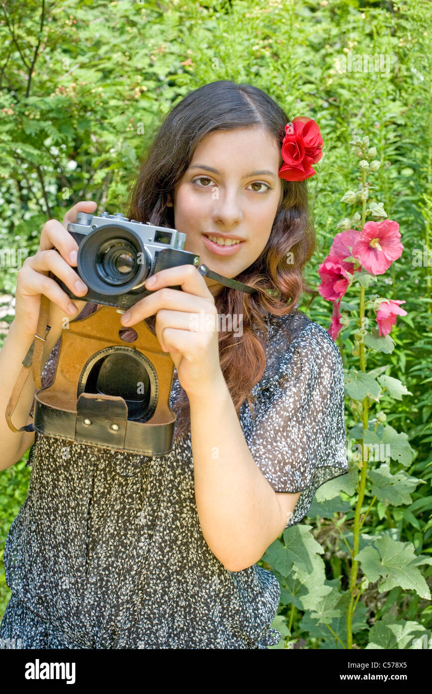 young woman taking a photo Stock Photo - Alamy