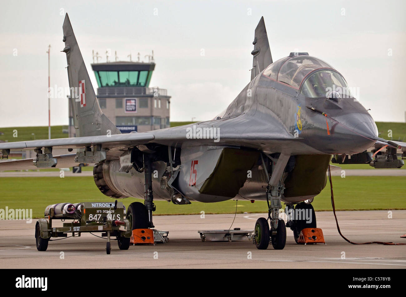 mig 29 jet aircraft in front of control tower Stock Photo - Alamy