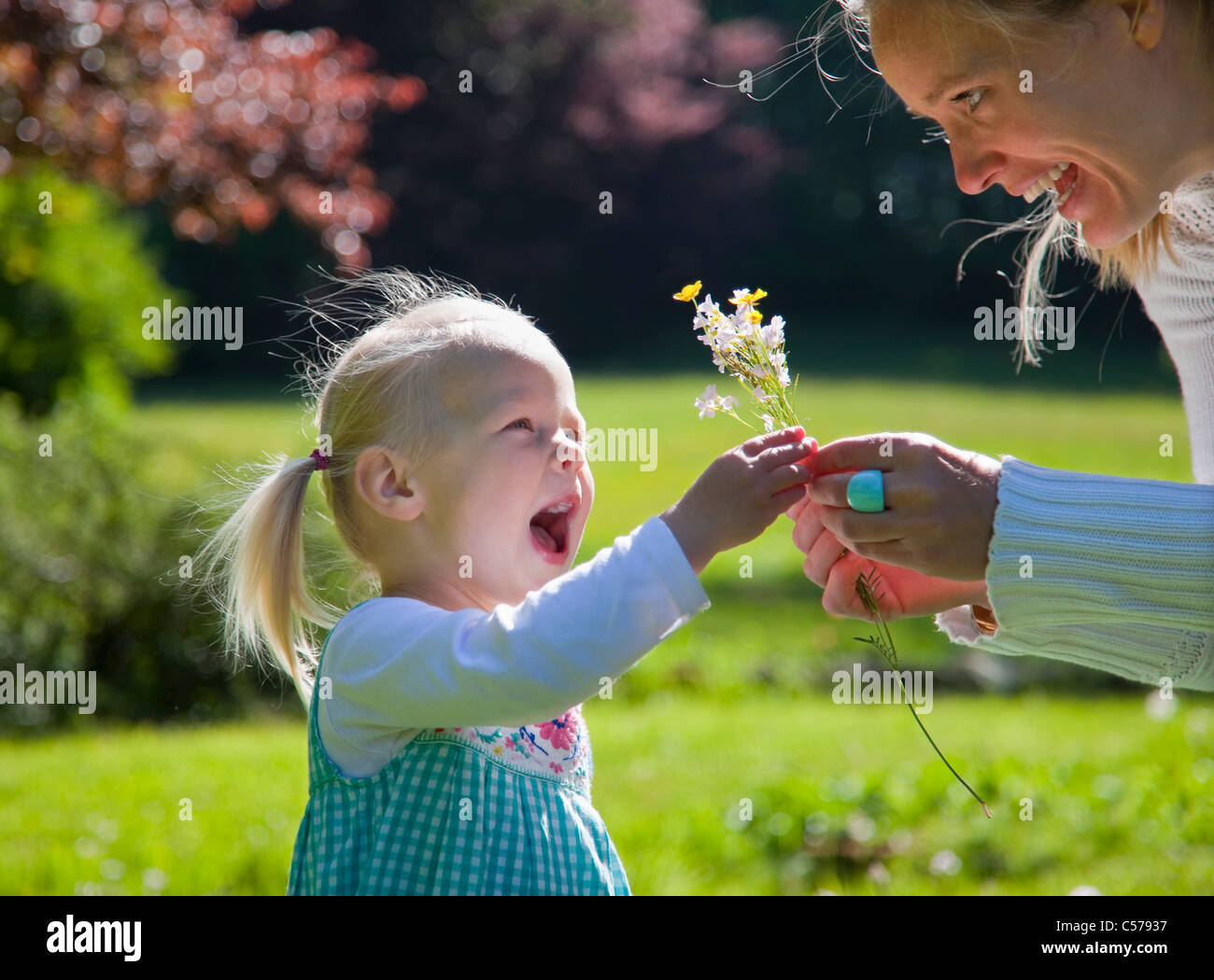 Child flowers mother bunch hi-res stock photography and images - Alamy