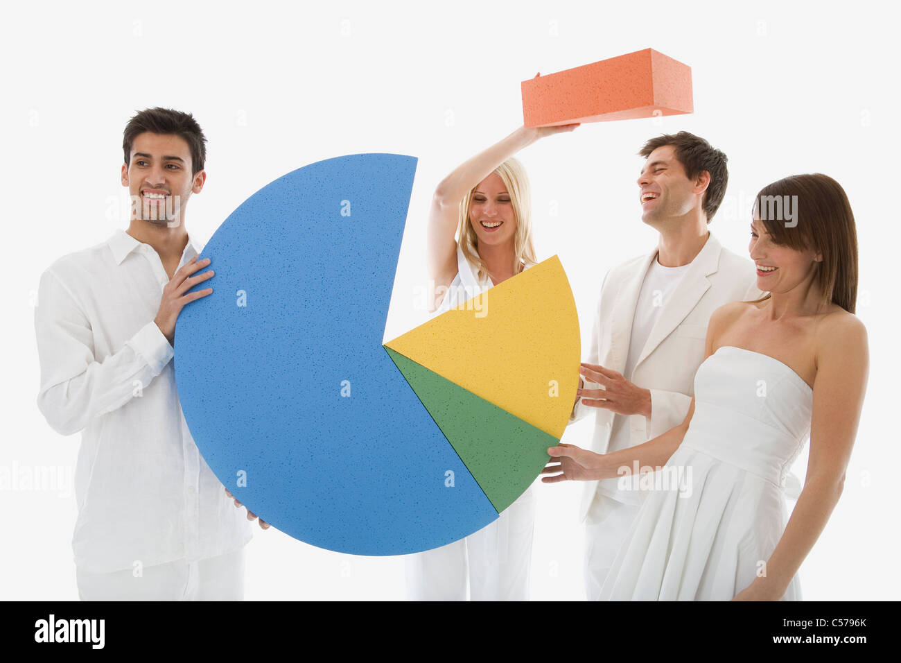 People playing with pie chart Stock Photo - Alamy