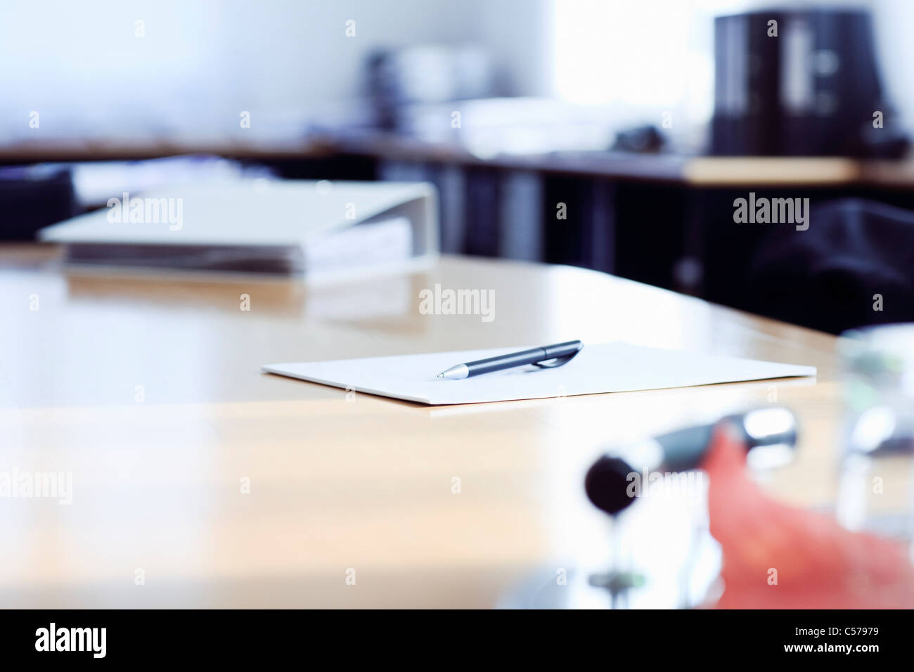 Papers and pen on office desk Stock Photo - Alamy