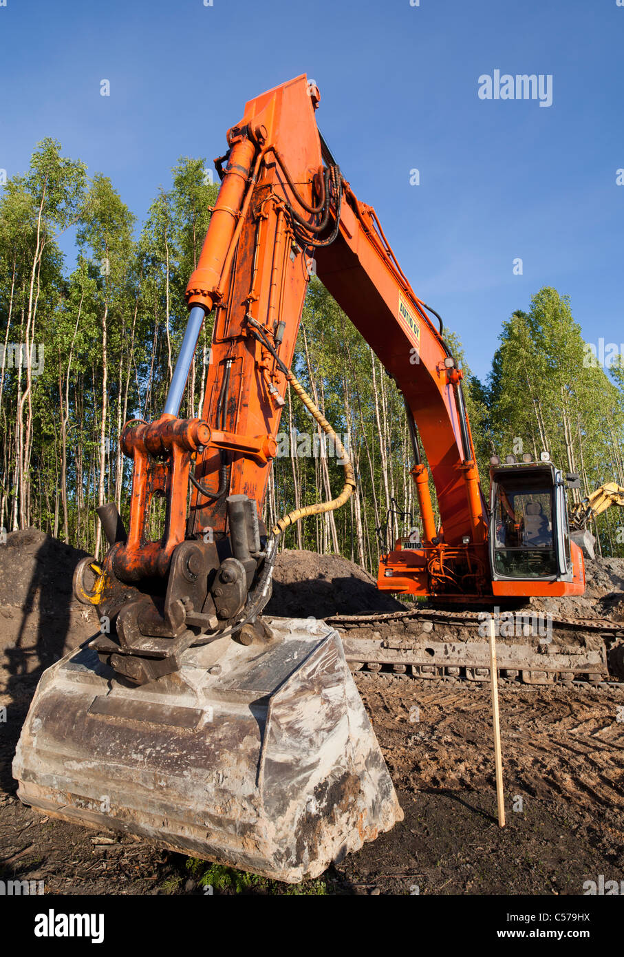 Orange Digger Stock Photos & Orange Digger Stock Images - Alamy