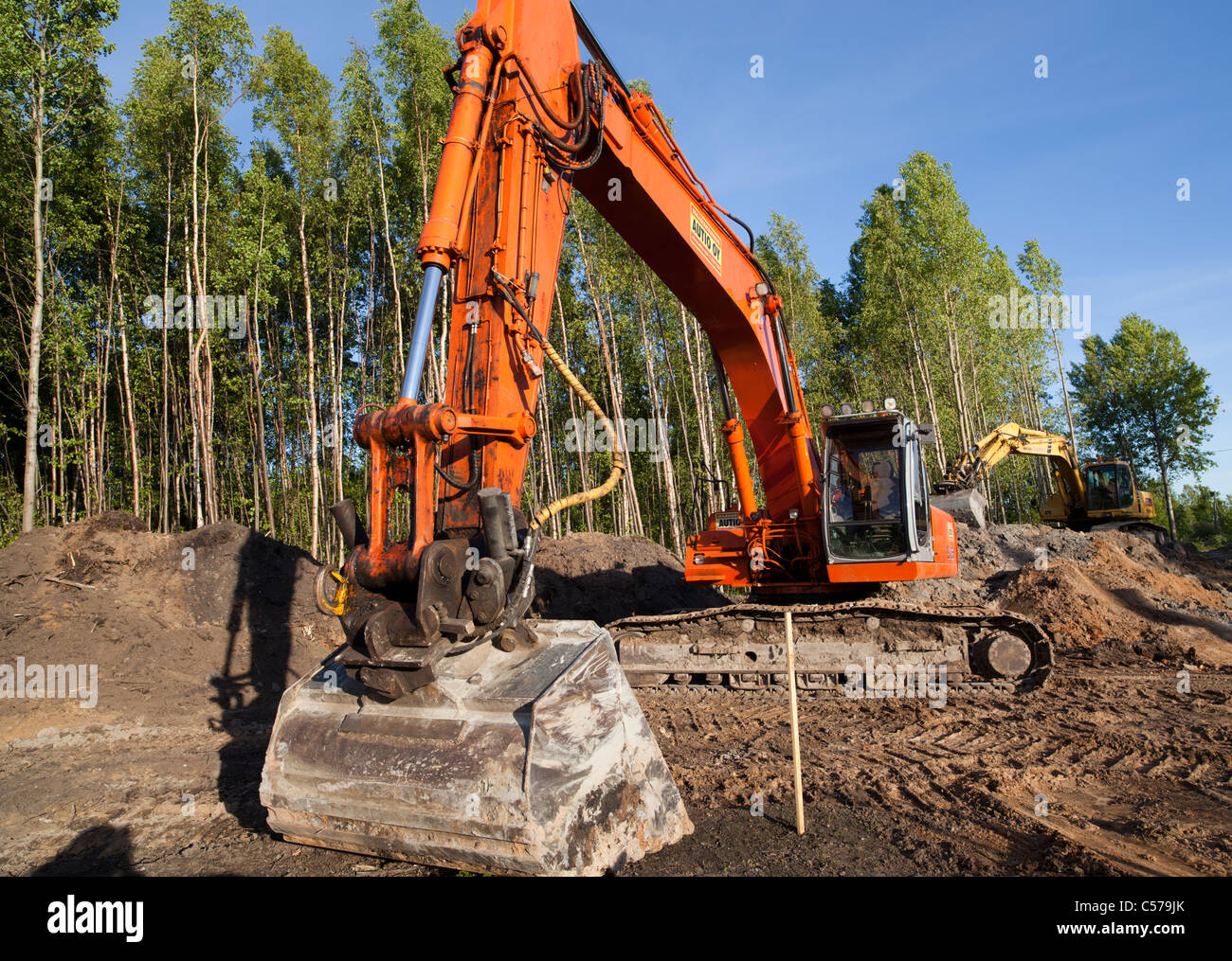 Orange digger hi-res stock photography and images - Alamy