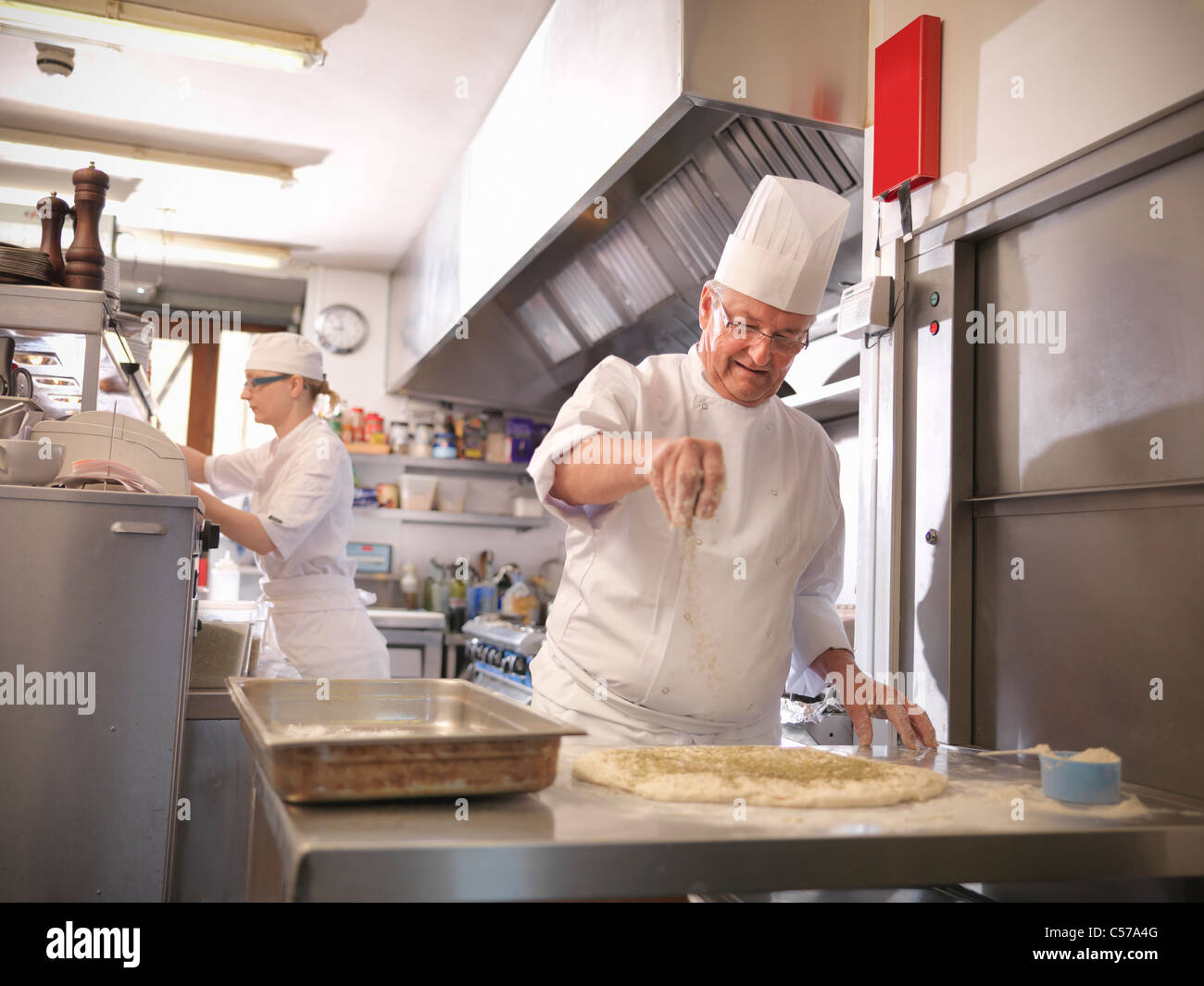 Woman Baking Bread In Kitchen High Resolution Stock Photography and ...