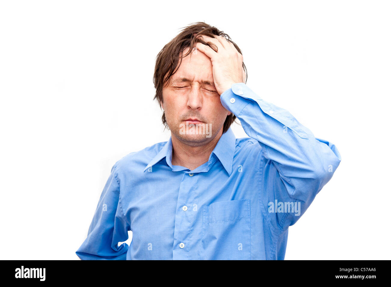 Young businessman looking anxious and worried, having a headache Stock ...