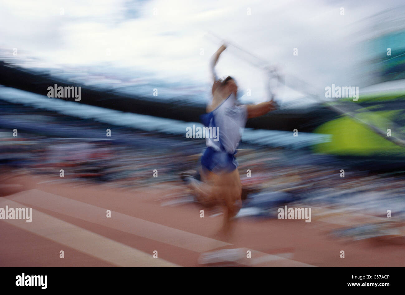 Pole vaulter in action Stock Photo - Alamy