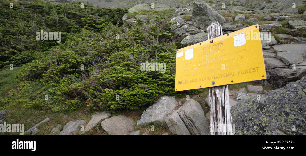 Yellow warning sign along the Appalachian Trail in the White Mountains ...