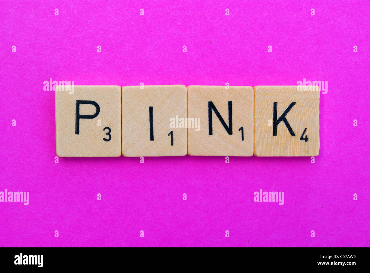 Pink spelled on a pink background Stock Photo - Alamy