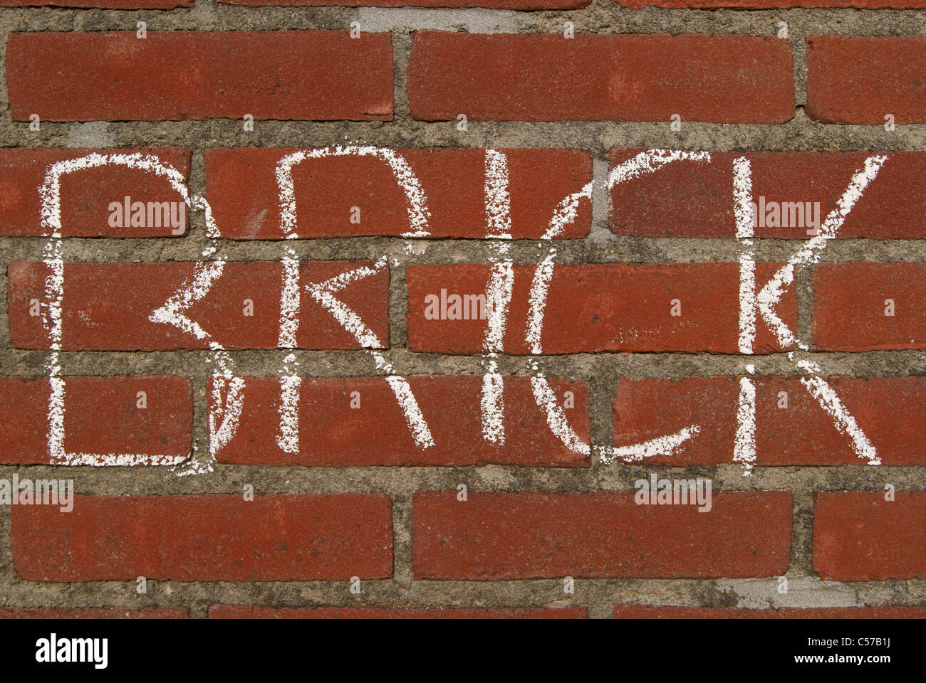 Brick wrote on a brick wall Stock Photo - Alamy