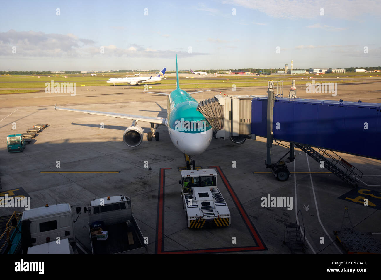aer lingus aircraft passenger jet and pushback tug at dublin airport ...