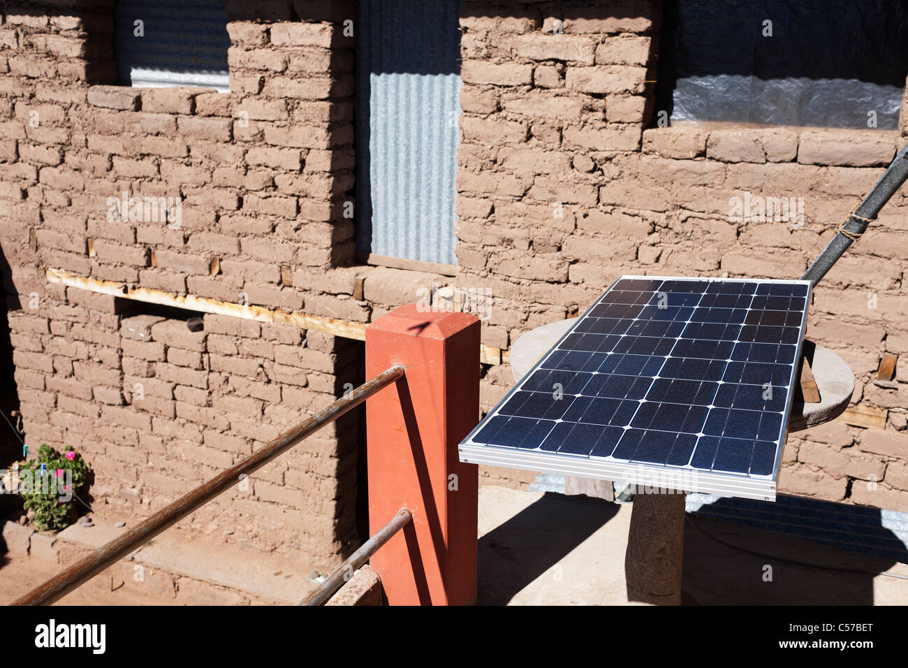 A solar power panal installed at a mud brick house on the island of ...