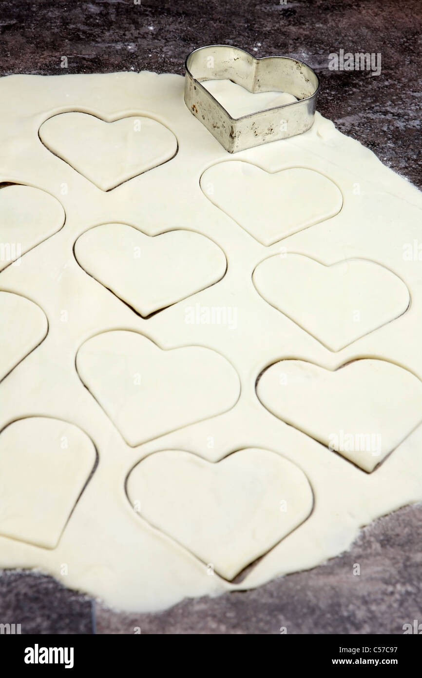 a rolled out dough for biscuits with cookie cutter for cookies Stock ...