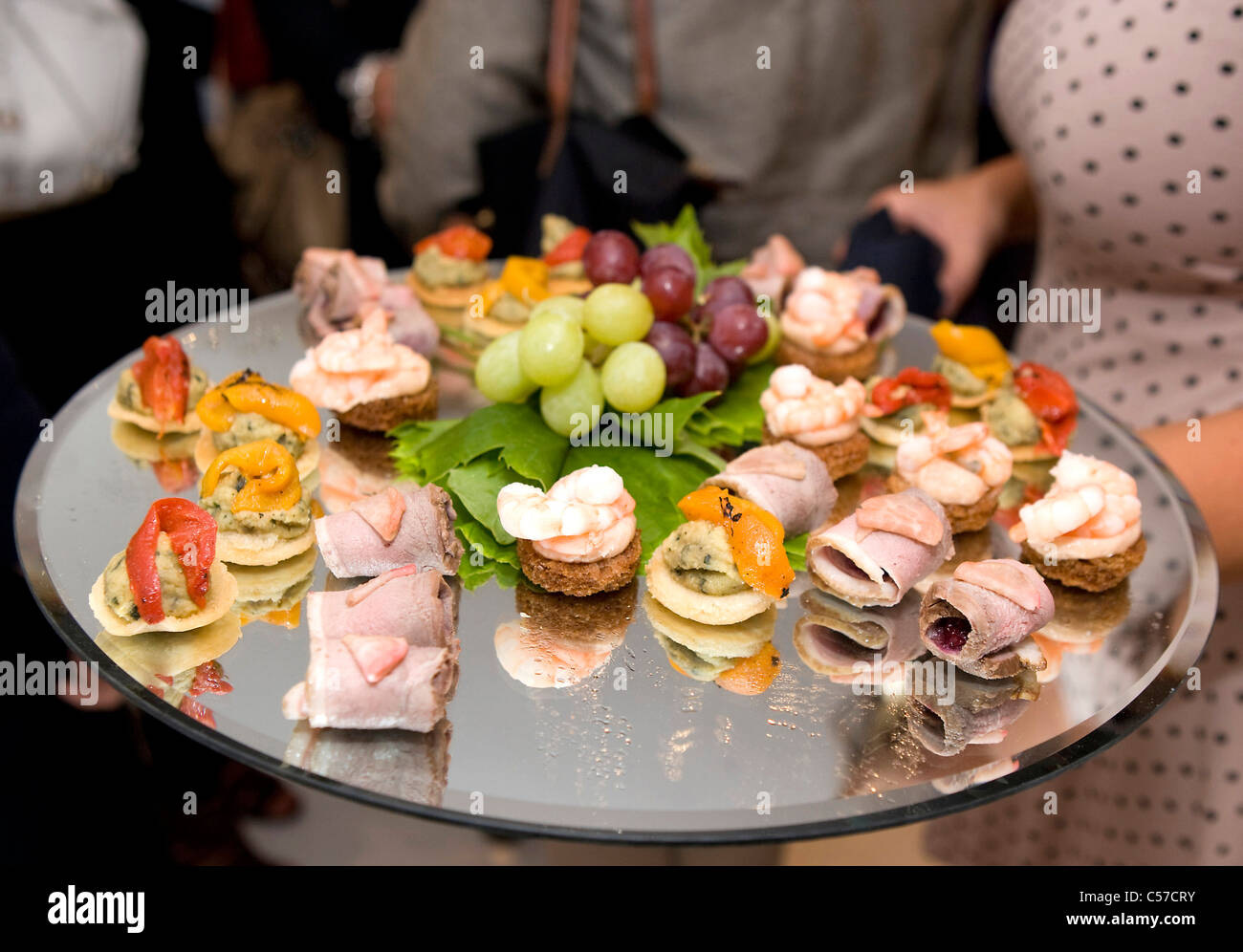Canapés on a tray at a party Stock Photo - Alamy