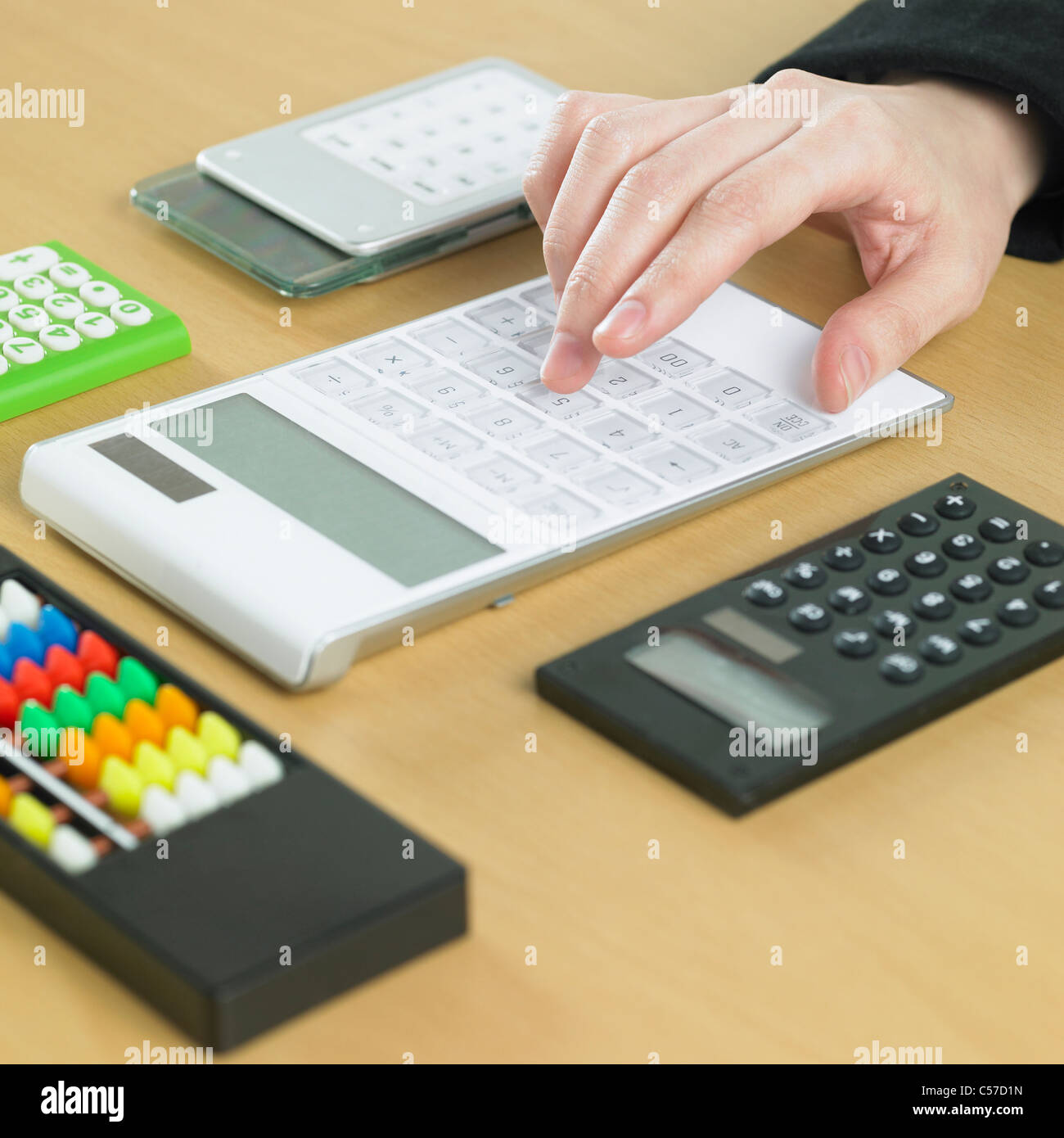 calculating and business benefits Stock Photo - Alamy