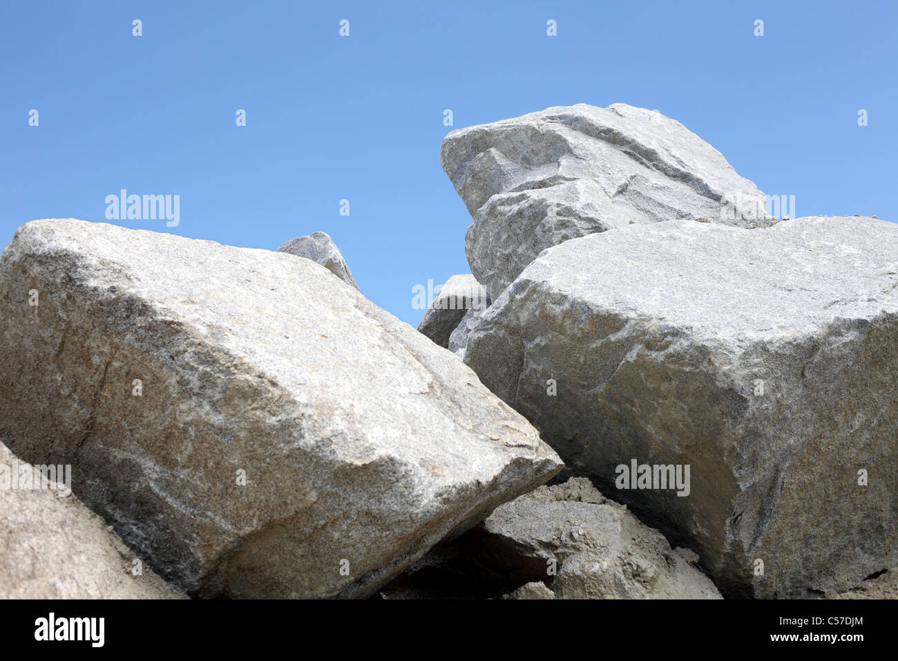Huge stones and blue sky Stock Photo - Alamy