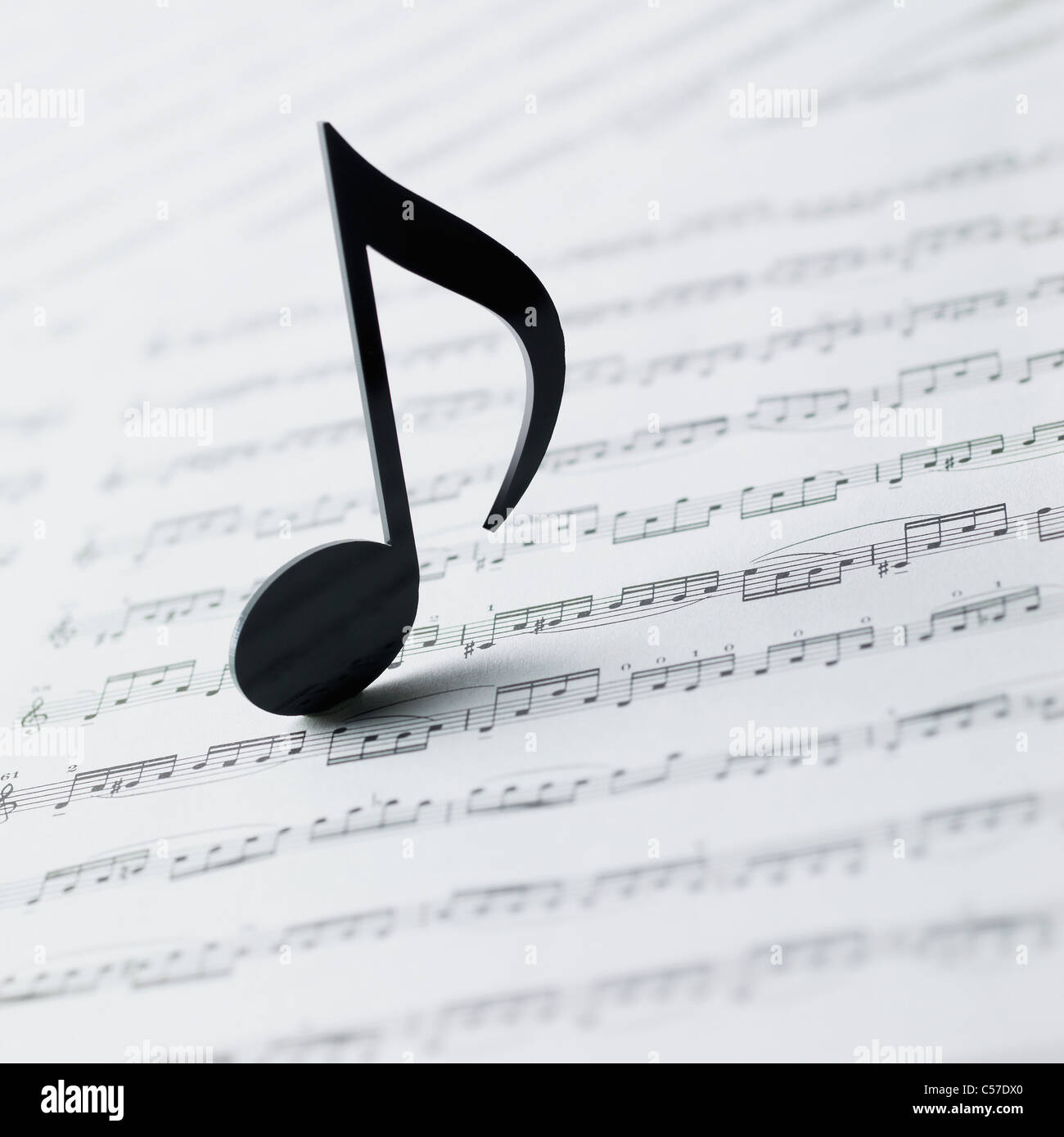 Musical note and score Stock Photo - Alamy