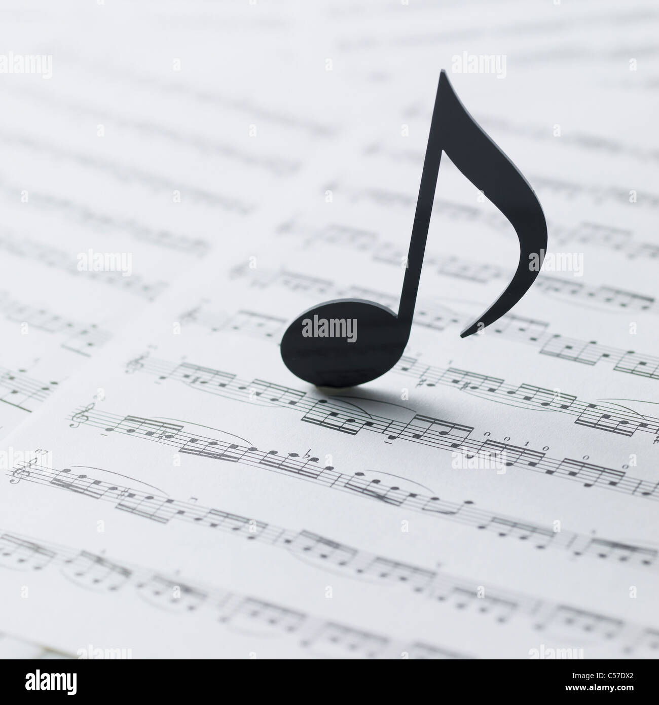 Musical note and score Stock Photo - Alamy