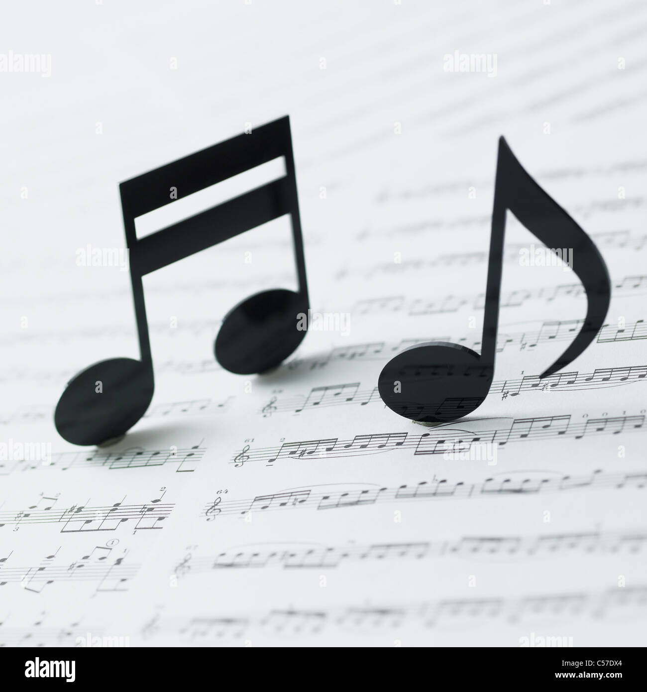 Musical note and score Stock Photo - Alamy