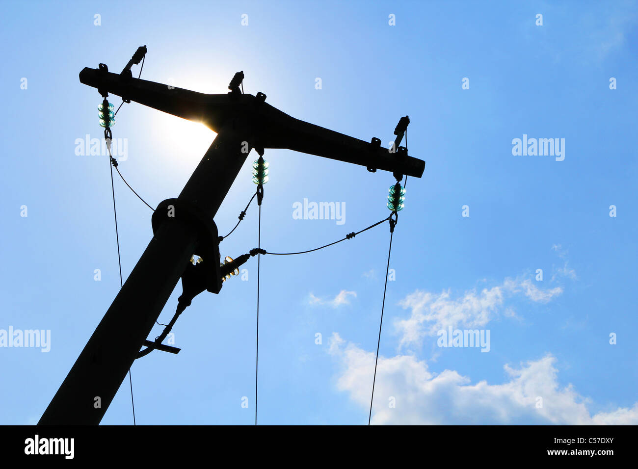 powerline/transmission line with blue sky background Stock Photo - Alamy