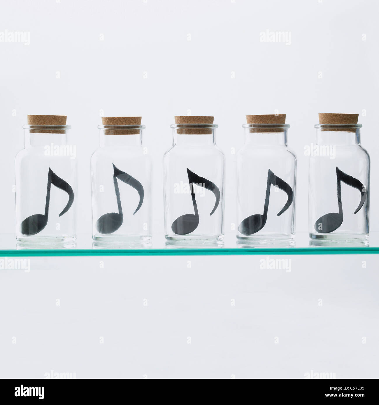 Musical notes in the bottle Stock Photo - Alamy