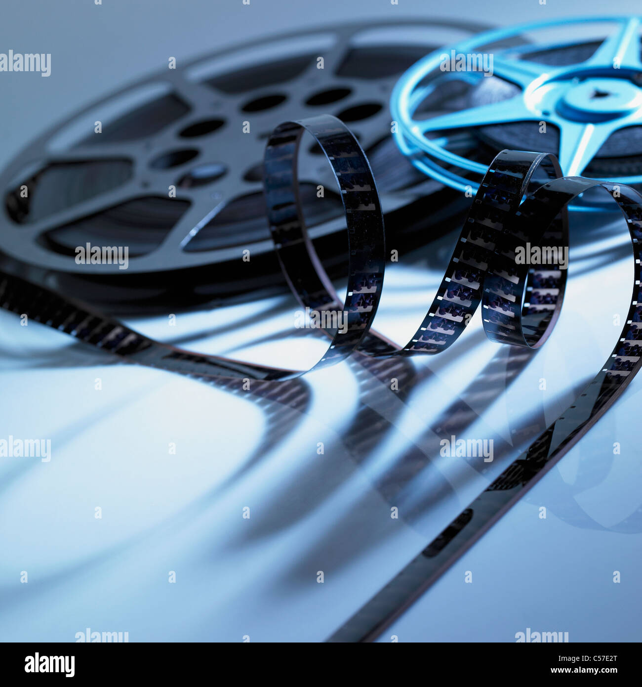 Unwinding film reel Stock Photo - Alamy