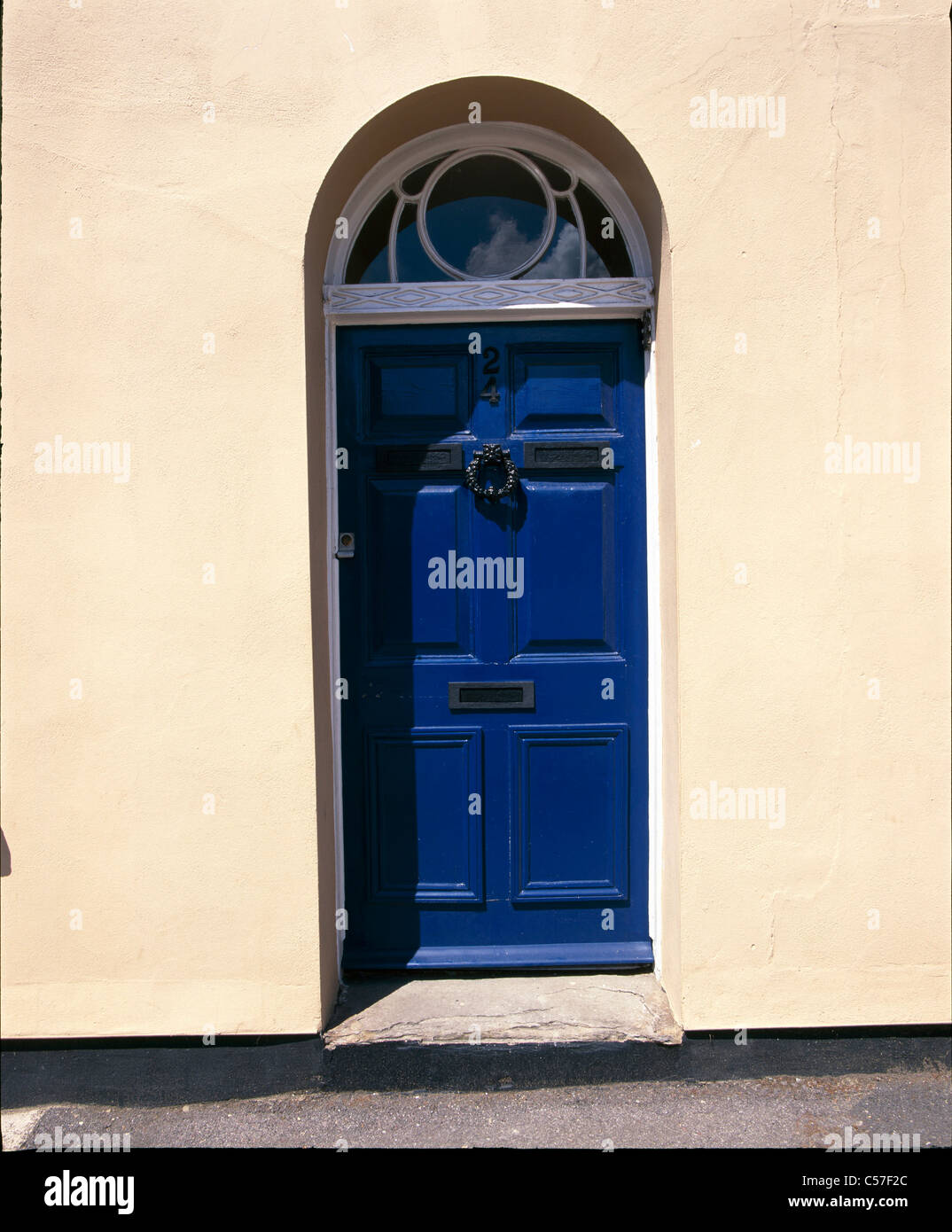 Doors - blue painted regency door with fanlight over Stock Photo - Alamy