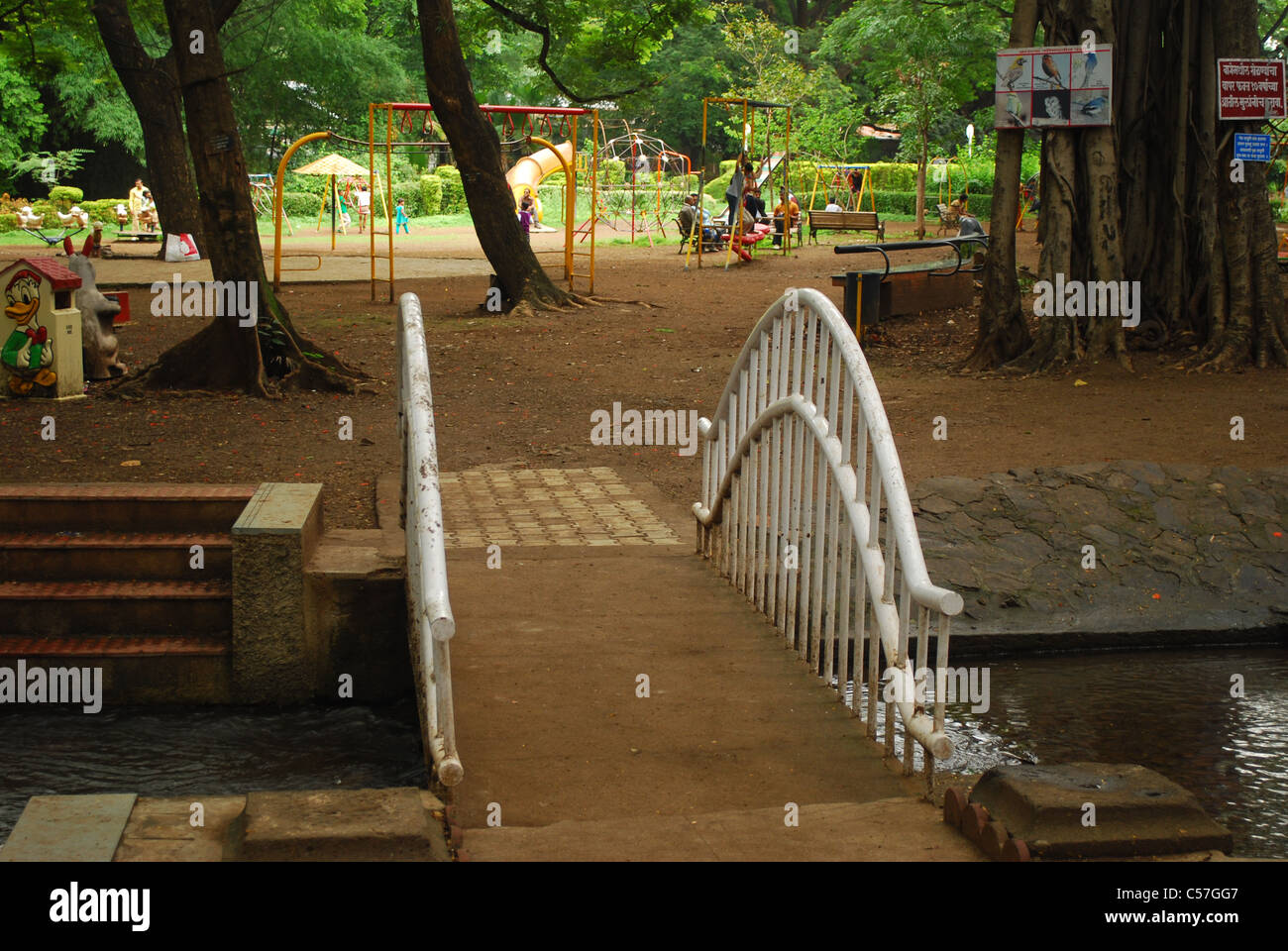 garden crossing small bridge Stock Photo - Alamy