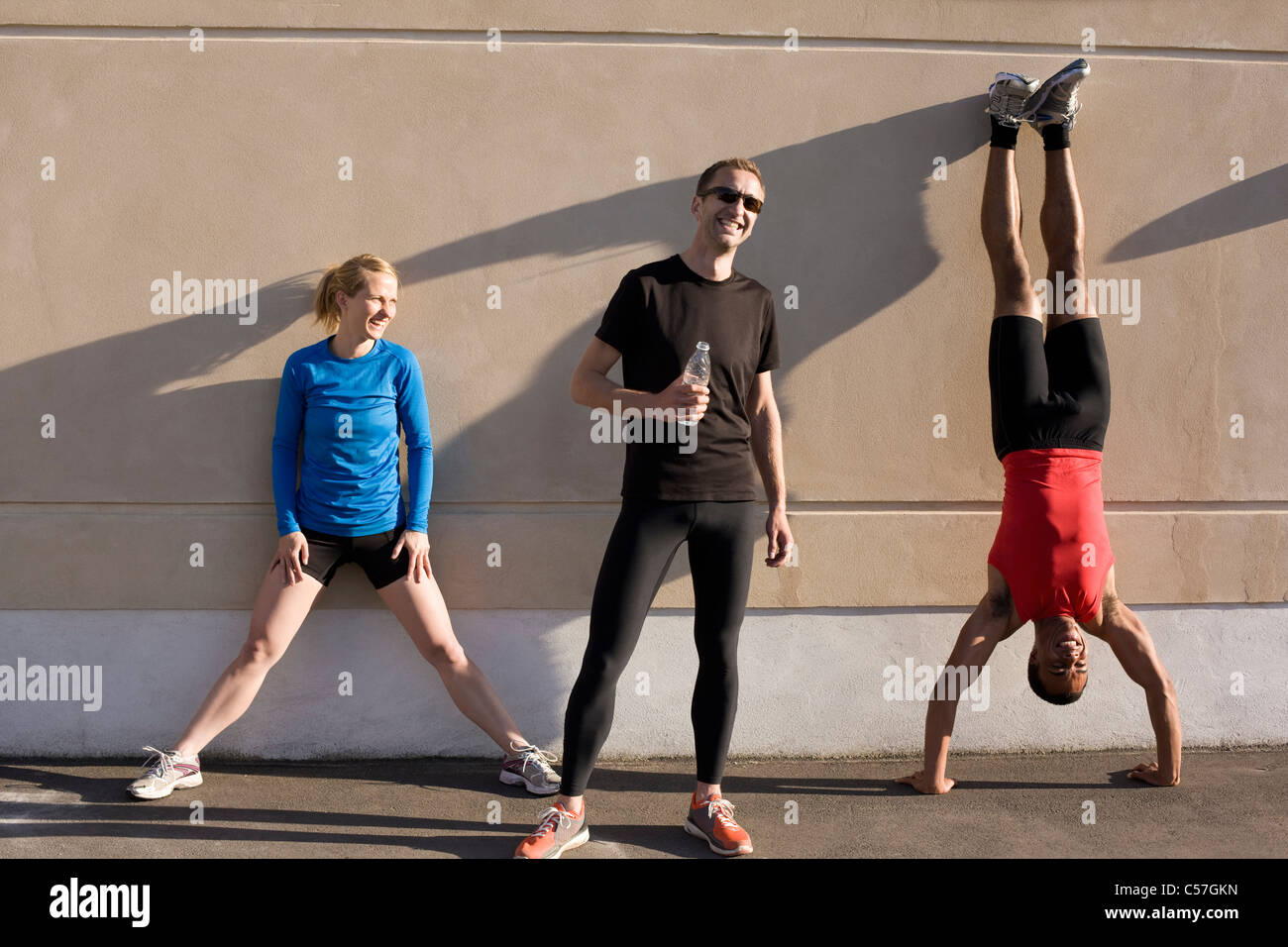 Friends talking after running together Stock Photo - Alamy