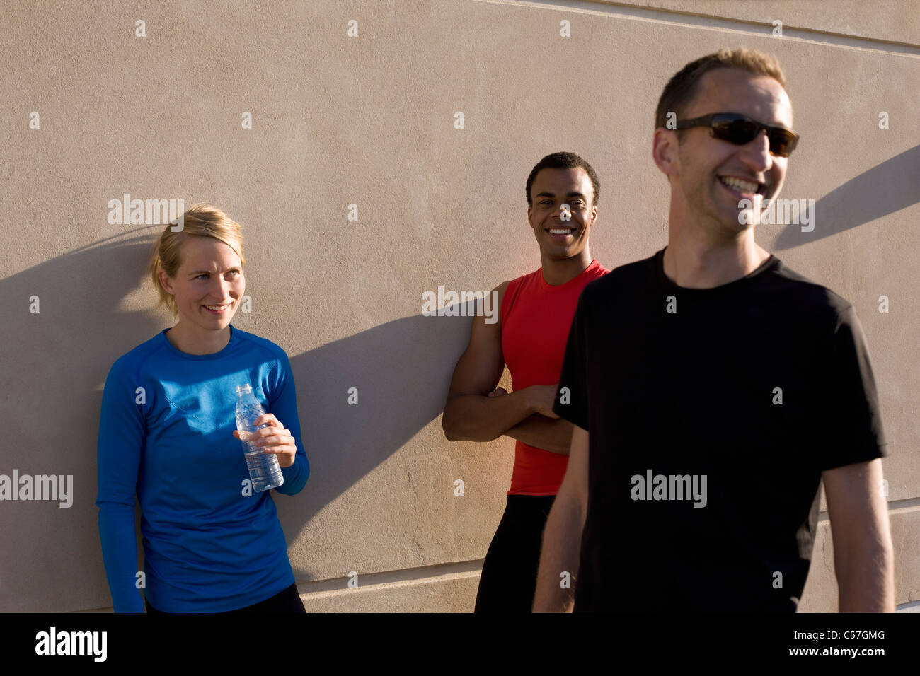 Friends talking after running together Stock Photo - Alamy